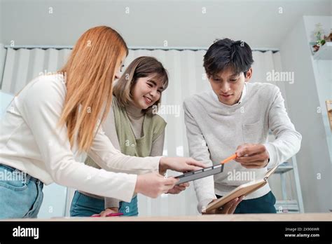 Asian Business Creative Team Work Together Mobile Application Software Design Project