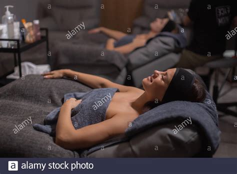 Side View On Young Caucasian Women Relaxing In Spa Wellbeing Salon