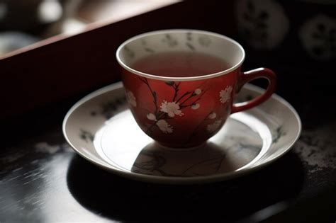 Premium AI Image A Cup On A Saucer With A Floral Pattern