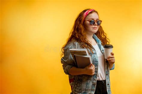 Portrait Of Funny Cheerful Redhead Girl Wearing Big Pink Glasses Stock