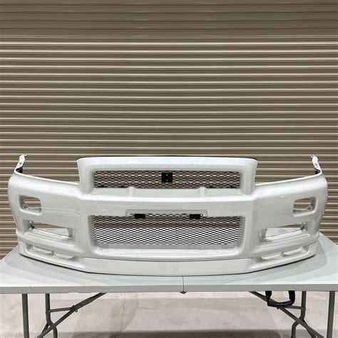 【やや傷や汚れあり】bnr34 R34 Gt R 純正 フロントバンパー 純正網付き リップ付き ステー付き Qt1 3層インタークーラー対応