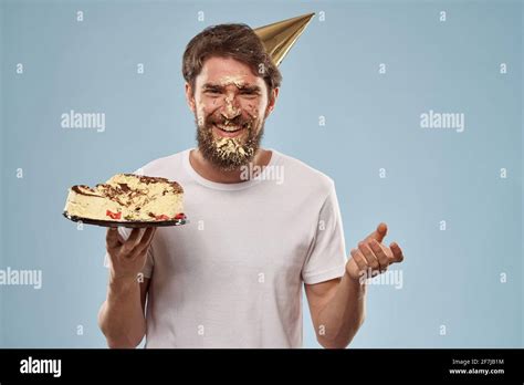 Cheerful Man Cake Birthday Celebration Blue Background Stock Photo Alamy