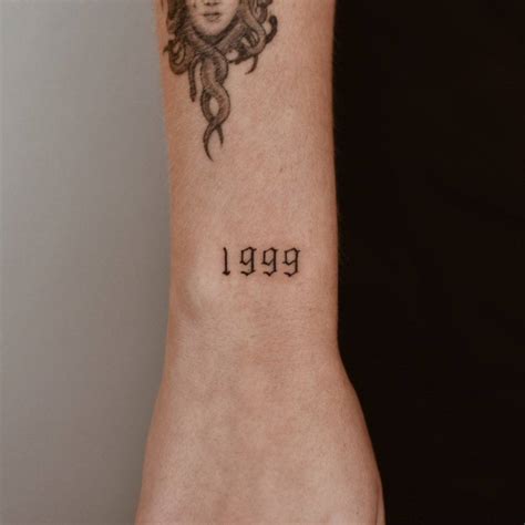 Lettering Tattoo Located On The Wrist