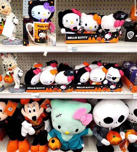 Many Hello Kitty Stuffed Animals Are On Display In A Store Shelf With