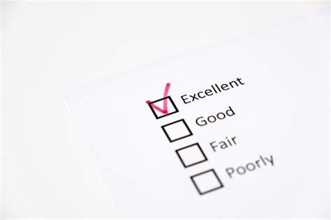 Premium Photo Mark Excellent Checkbox With Red On Checklist On White Paper