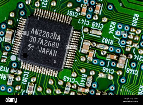 Surface Mount Technology SMT Components On Green Printed Circuit