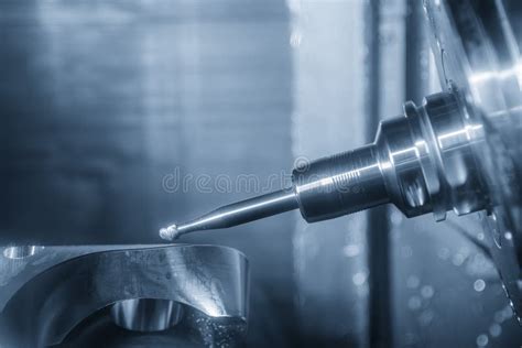 The 5 Axis Cnc Milling Machine Cutting The Automotive Part With Solid Ball End Mill Tool Stock