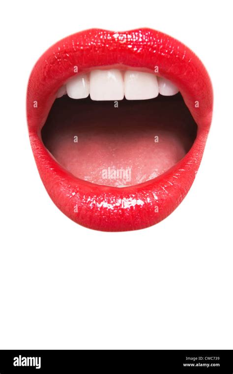 Close Up View Of Female Wearing Red Lipstick With Mouth Open Over White