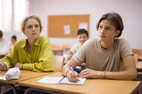Teenage Pupils Sitting At Desk In Classroom Stock Image Image Of Girl Classmate 281136531