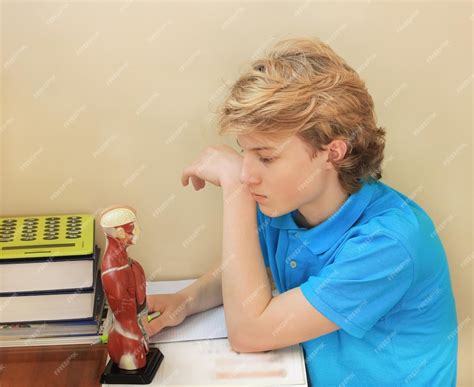 Premium Photo Boy Doing Homework