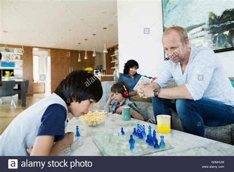 Father And Son Playing Chess Stock Photo Alamy