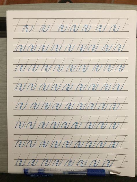 Beautiful Blue Cursive Writing On Paper