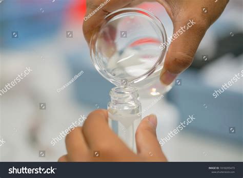 Scientist Pouring Liquid Erlenmeyer Flask Measurement Stock Photo 1018205473 Shutterstock