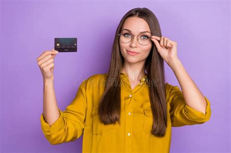 Photo Of Hr Brown Hair Lady Hold Card Wear Eyewear Brown Shirt Isolated