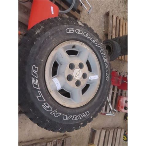 4 Tires With Rims Lt 235 75 R15 Some Not Holding Air But They