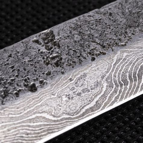 Background With A Pattern Of Damascus Steel Macro Shot Of Damascus