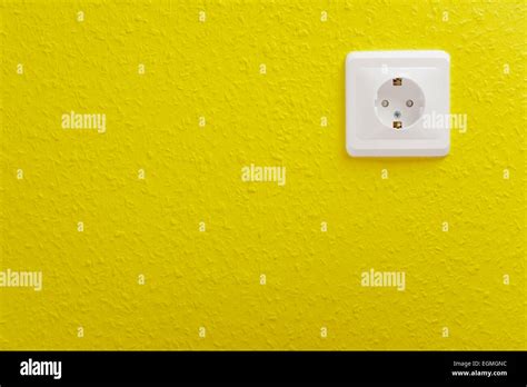 Single Electric Socket With Plug On Wall Stock Photo Alamy