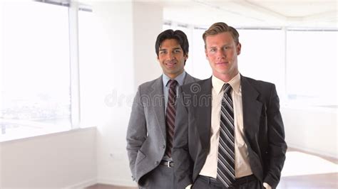 Two Businessmen Standing Smiling Stock Footage Video Of Together