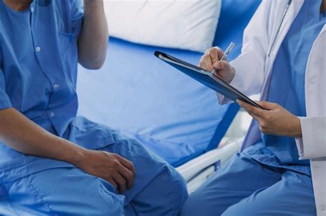 Premium Photo Doctor Check Up After Surgery Doctor Touching Patient