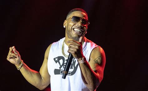 Nelly Knocks His Tooth Out Calls Ashanti On Ig She Laughs Loudly