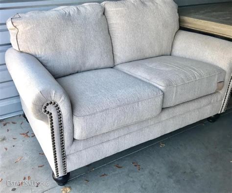 Ashley Loveseat Beige Color Like New