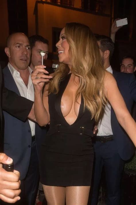 Mariah Carey Exposes Nipple Petal In Plunging LBD In QUITE The Wardrobe