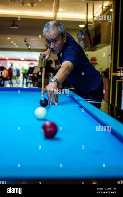 Old Man With Serious Style Playing Billiards Stock Photo Alamy