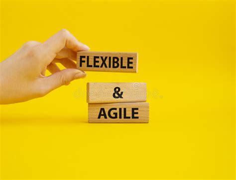 Flexible And Agile Symbol Concept Word Flexible And Agile On Wooden Blocks Beautiful Yellow