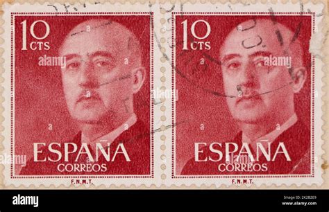Photo Of Two Red 10 Centimos Spanish Postage Stamp Featuring An Image