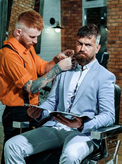 Premium Photo Barber Scissors And Straight Razor Bearded Client