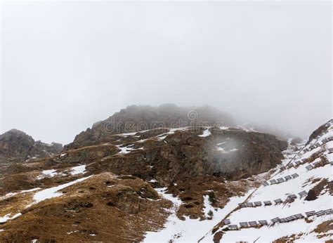 Panorama Of Mountainous Terrain Fog And Clouds Hang Over The Mountains Cloudy Sunset Evening