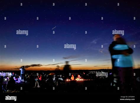 People Gather In The Bledowska Desert In Southern Poland As The Perseid