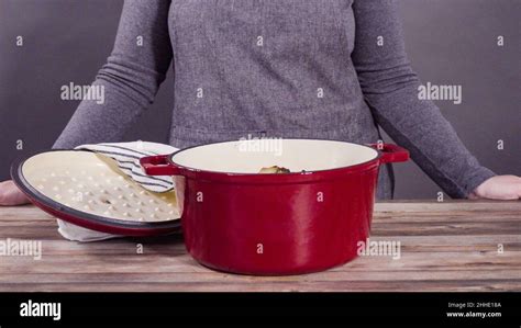 Baking Homemade Sourdough Wheat Bread In Cast Iron Dutch Oven Stock