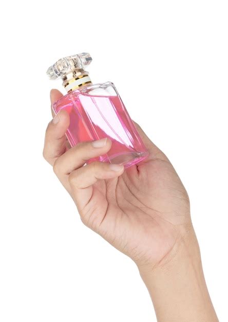 Premium Photo Hand Holding Perfume Glass Bottle Cosmetic Bottles