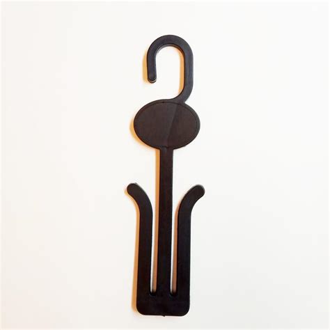 Вішалка для сушки підвішування взуття капелюхів чорна — ціна 15 грн у каталозі Вішалки Купити