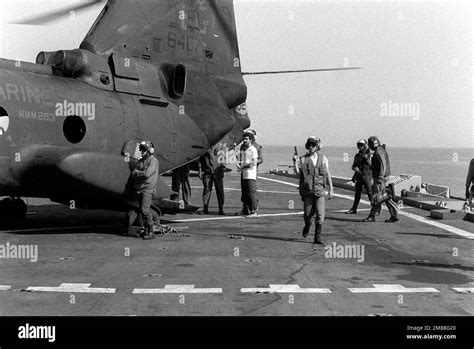 Crewmen Aboard A Us Naval Ship Escort Iranian Detainees From The Mine