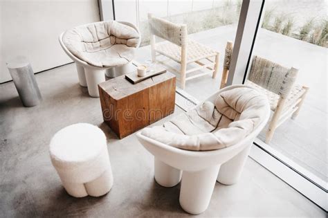 Interior Shot Of A Modern Living Space Featuring Two Matching Chairs