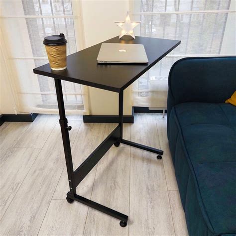 Столик на колесах з регулюванням висоти 80х40см чорний ціна 1796 ₴ купити на Prom Ua Україна
