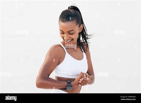 Happy Female Looking At Her Bicep Young Fit Woman Showing Her Muscles