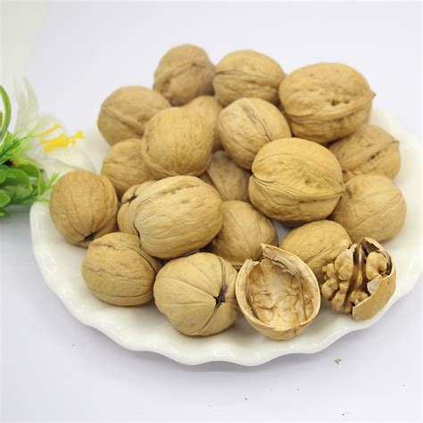 2023年新货新疆纸皮核桃袋装每包500g原味无漂白孕妇薄壳核桃零食虎窝淘