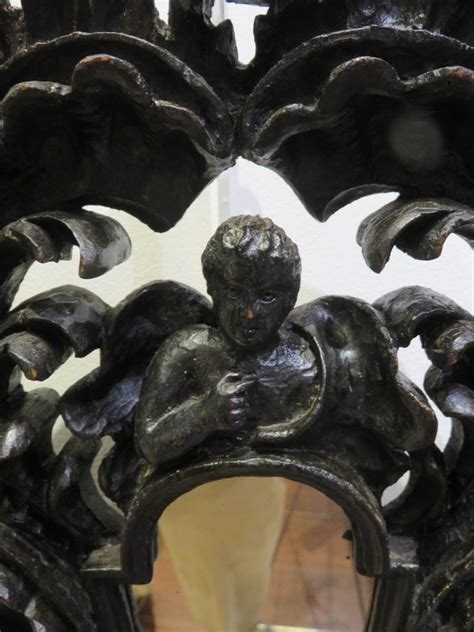 Proantic Paire de miroirs en bois sculpté Hauteur 60 cm aux mot
