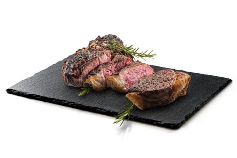 Fiorentina T Bone Steak On Rectangular Plate In Black Slate Stock Image