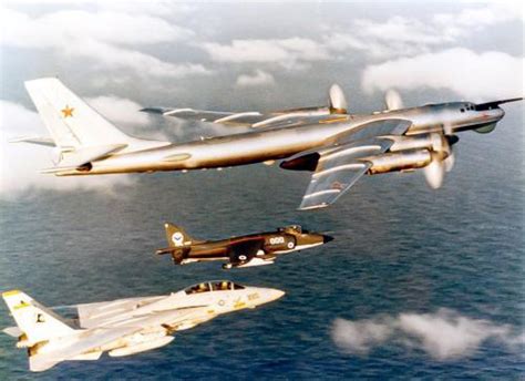 Usn F 14a Tomcat And British Sea Harrier Fly Formation With A Russian