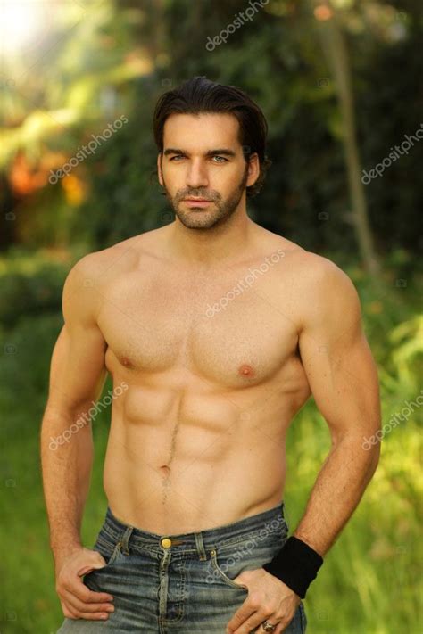 Outdoor Portrait Of A Shirtless Good Looking Fit Male Model Stock
