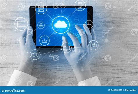 Hand Using Tablet With Centralized Cloud Computing System Concept Stock