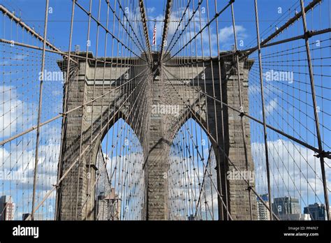 The Iconic Brooklyn Bridge Spanning The East River Between Lower