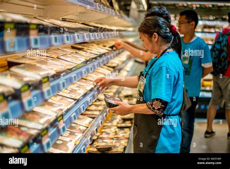 File Chinese Employees Work At A Store Of O2o Fresh Produce Retailer