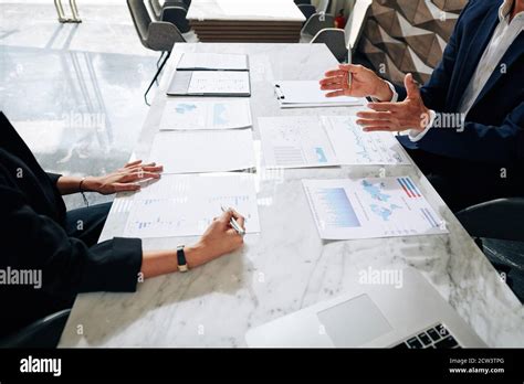 Business People Analyzing Charts Stock Photo Alamy