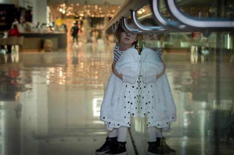 Premium Photo Girl Standing By Railing