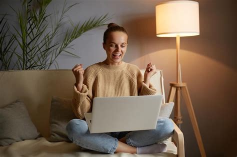 Premium Photo Indoor Shot Of Extremely Happy Excited Woman Wearing